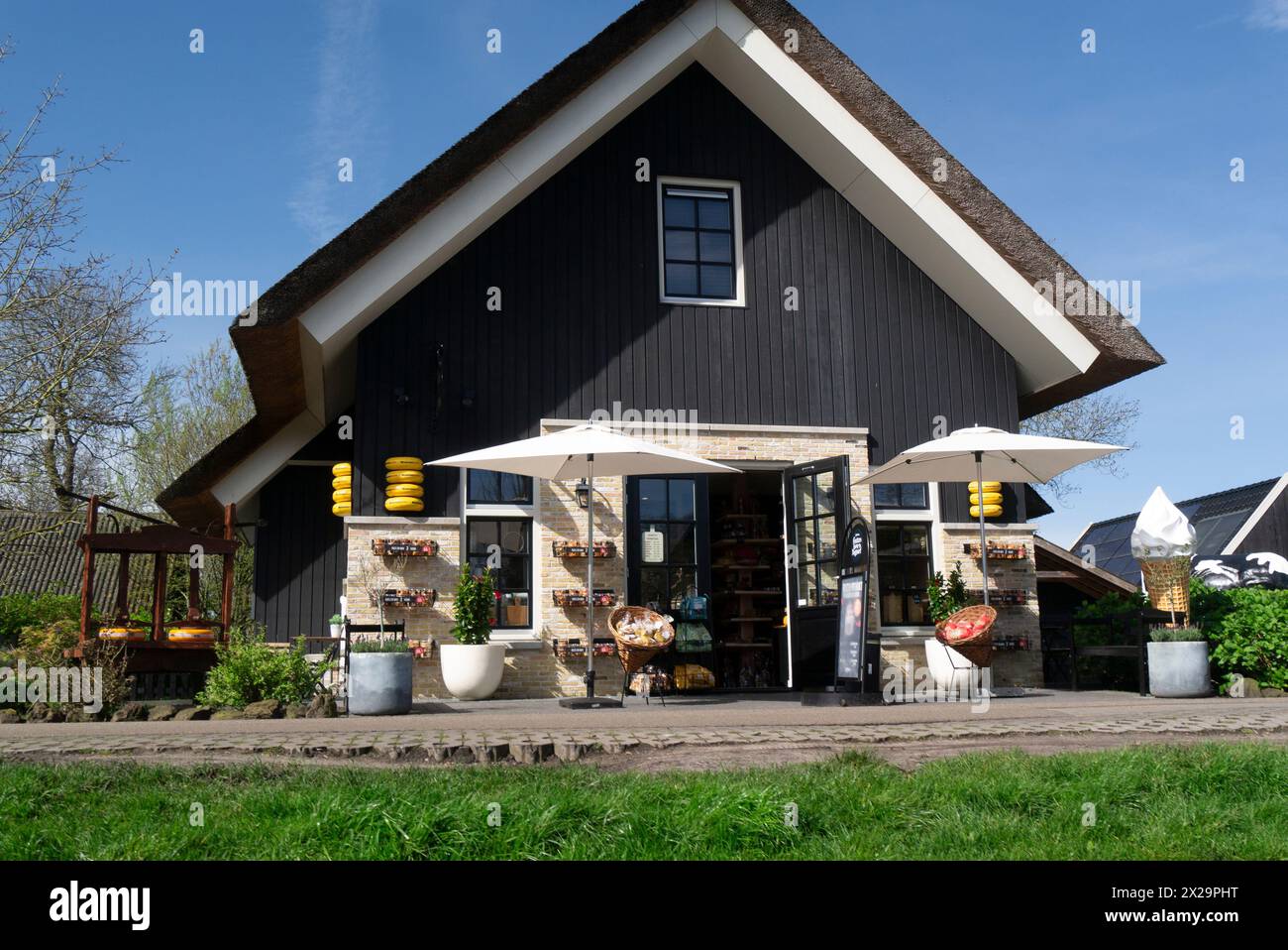 Shop at side of canal in unique Dutch traffic free village of Giethoorn ...