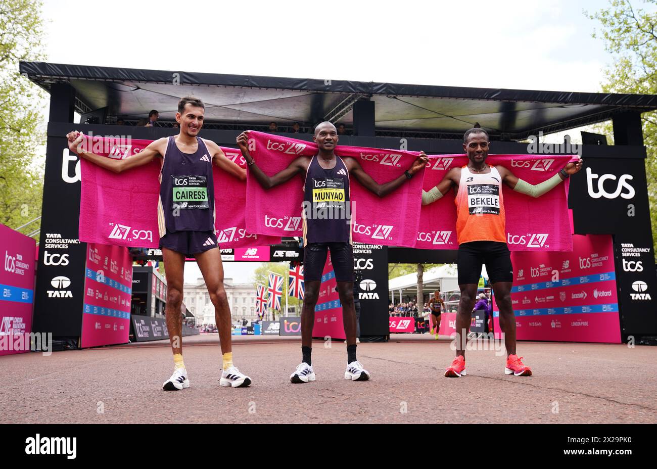 From left, Emile Cairess, Alexander Mutiso Munyao and Kenenisa Bekele after the men's elite race ...