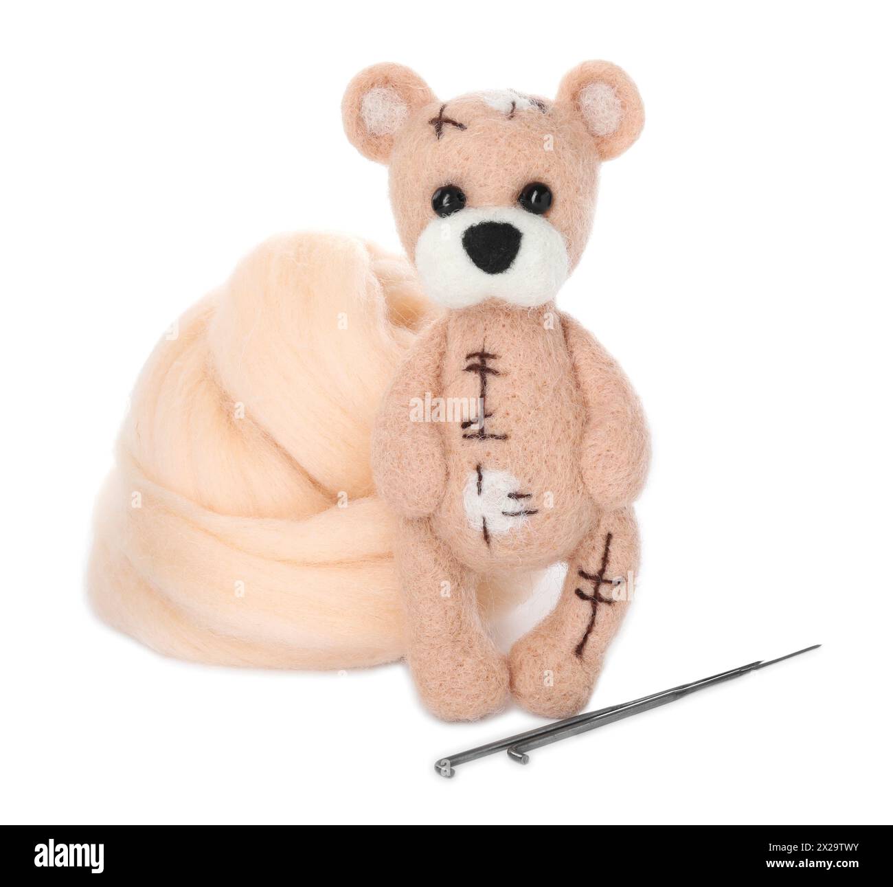 Felted bear, wool and needles isolated on white Stock Photo - Alamy