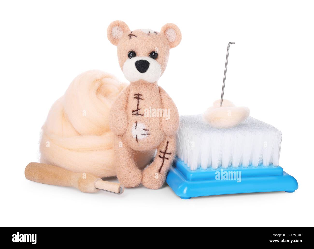 Needle felted bear, wool and tools isolated on white Stock Photo - Alamy
