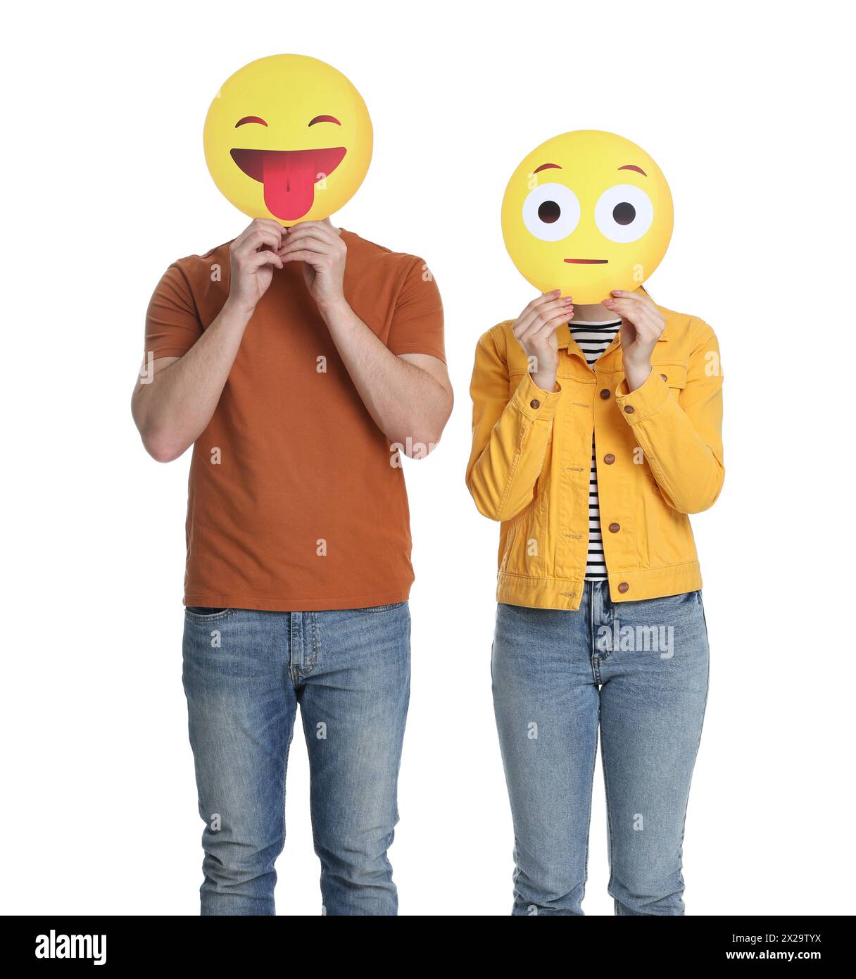 People covering faces with emoticons on white background Stock Photo ...