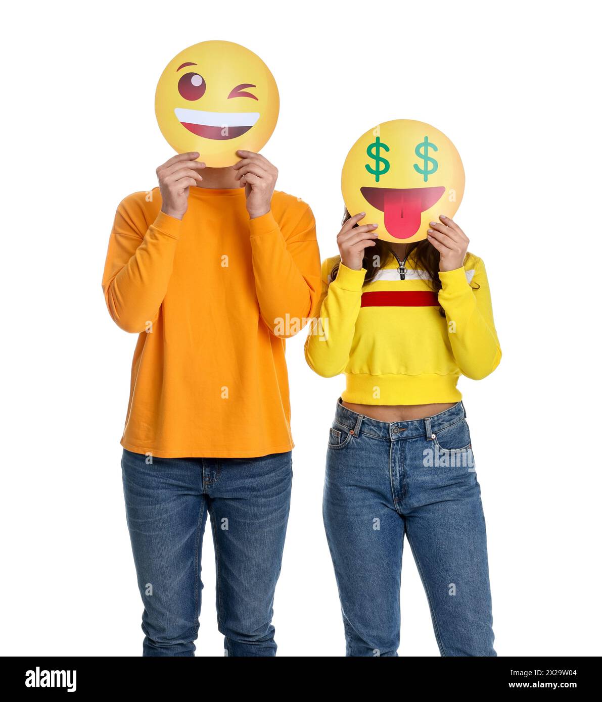 People covering faces with emoticons on white background Stock Photo ...