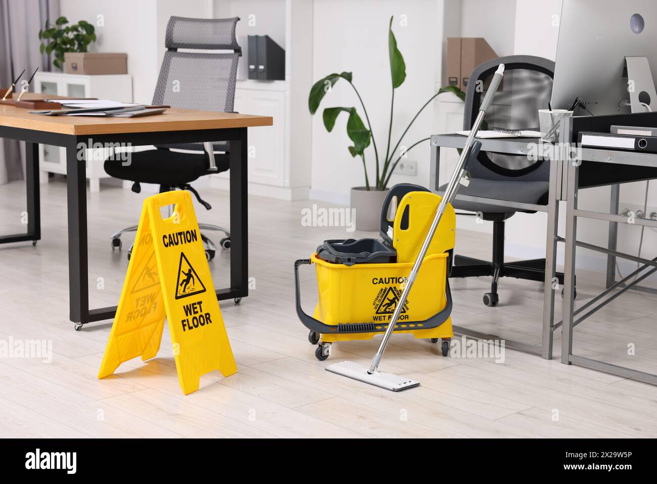 Mop bucket sign hi-res stock photography and images - Alamy