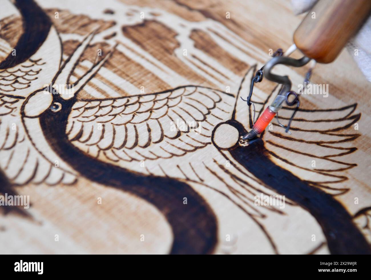 (240421) -- NANYANG, April 21, 2024 (Xinhua) -- Li Zhe makes a wooden ...