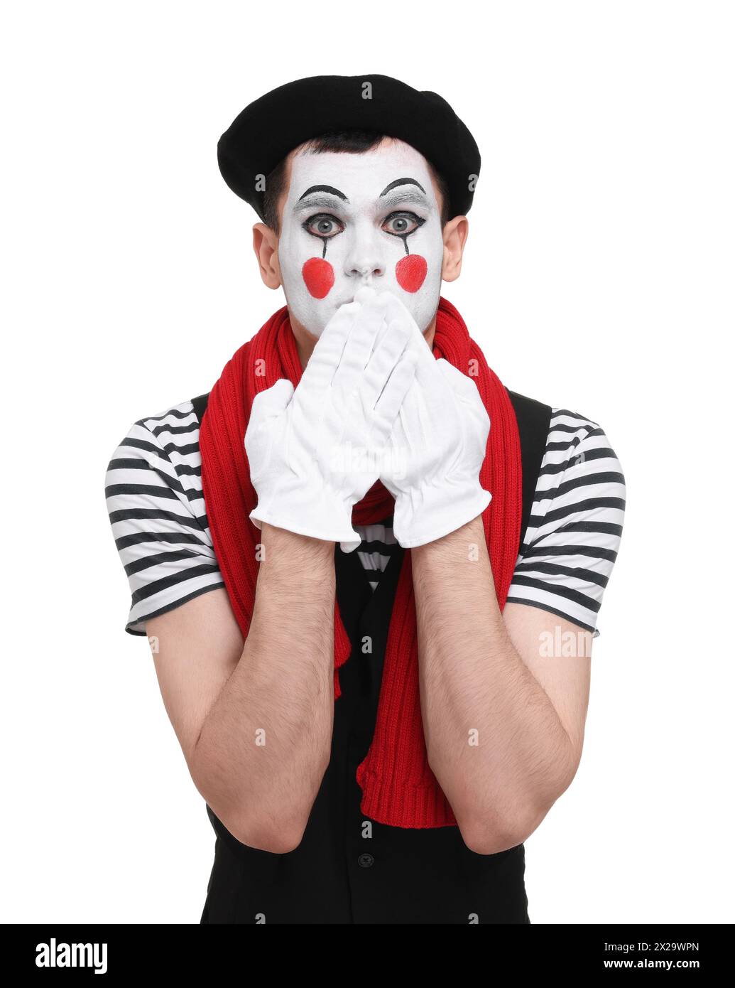 Mime artist making shocked face on white background Stock Photo - Alamy