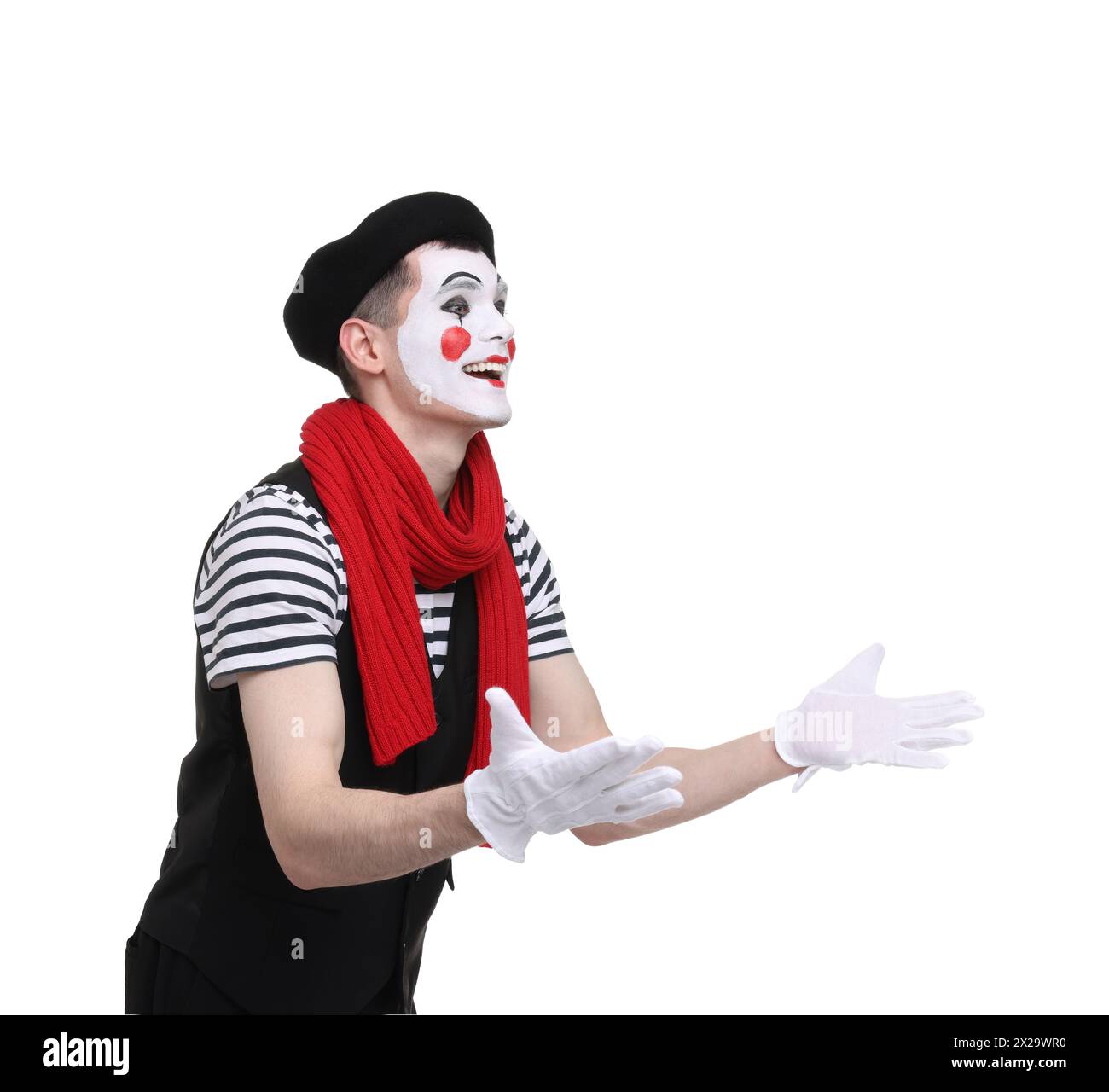 Funny mime artist in beret posing on white background Stock Photo - Alamy