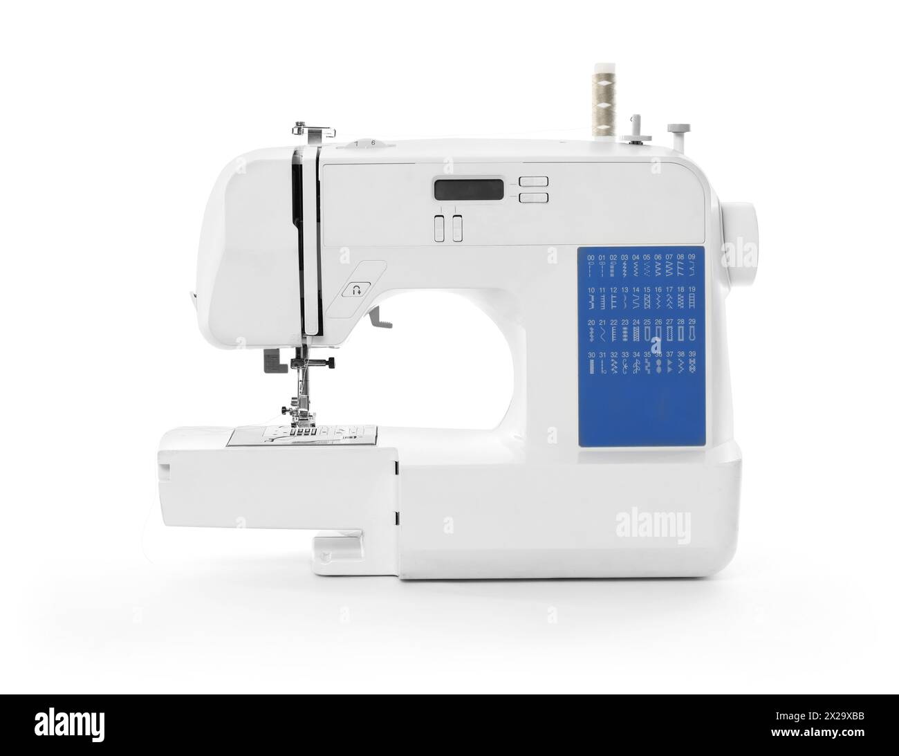 One modern sewing machine isolated on white Stock Photo - Alamy