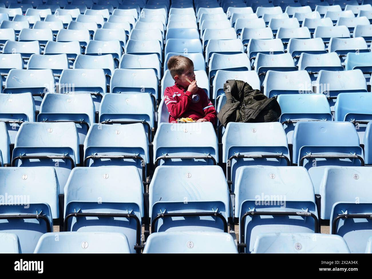 A young Aston Villa fan in the stands before the Premier League match ...