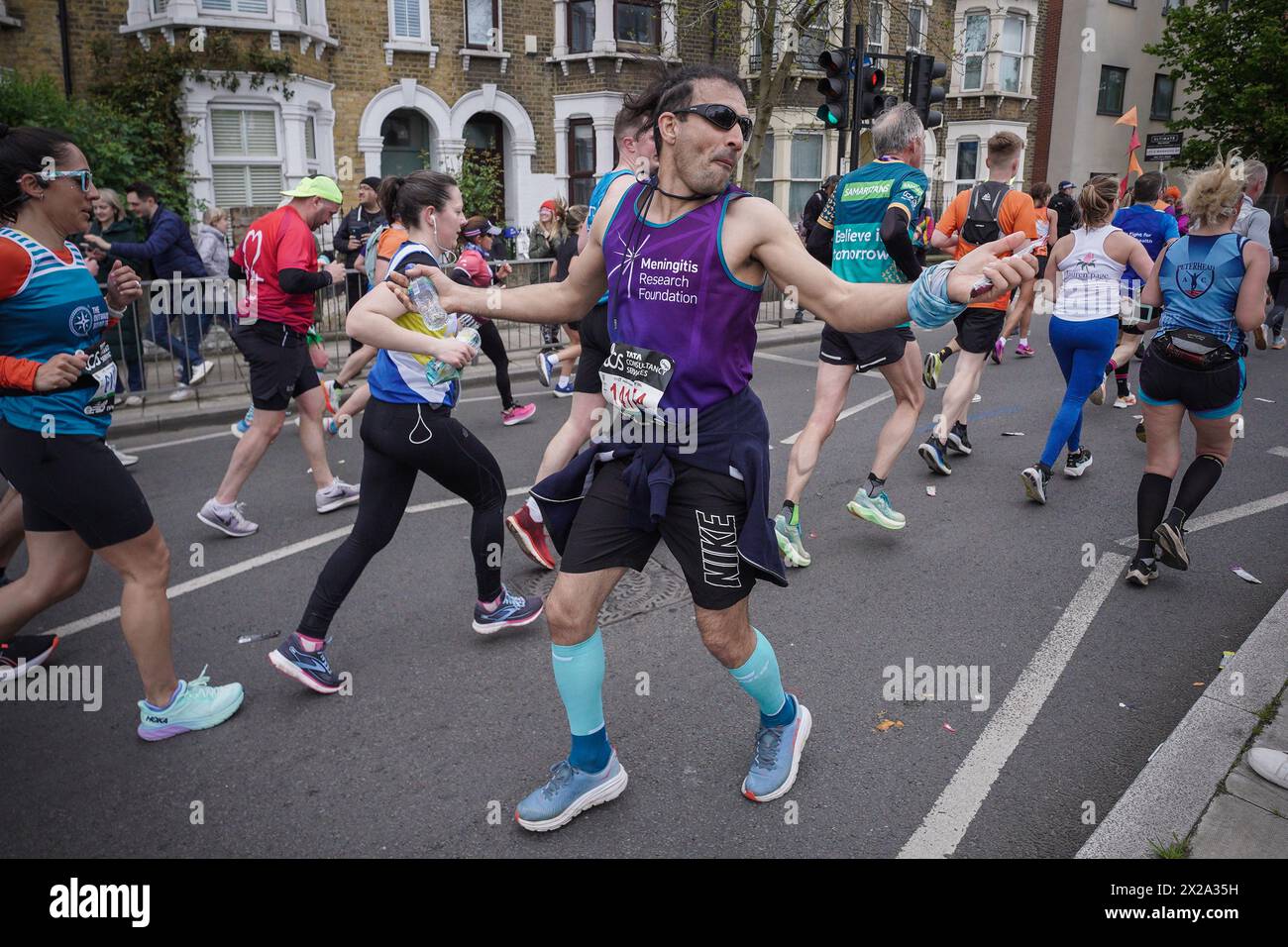 Backwards marathon runner hi-res stock photography and images - Alamy