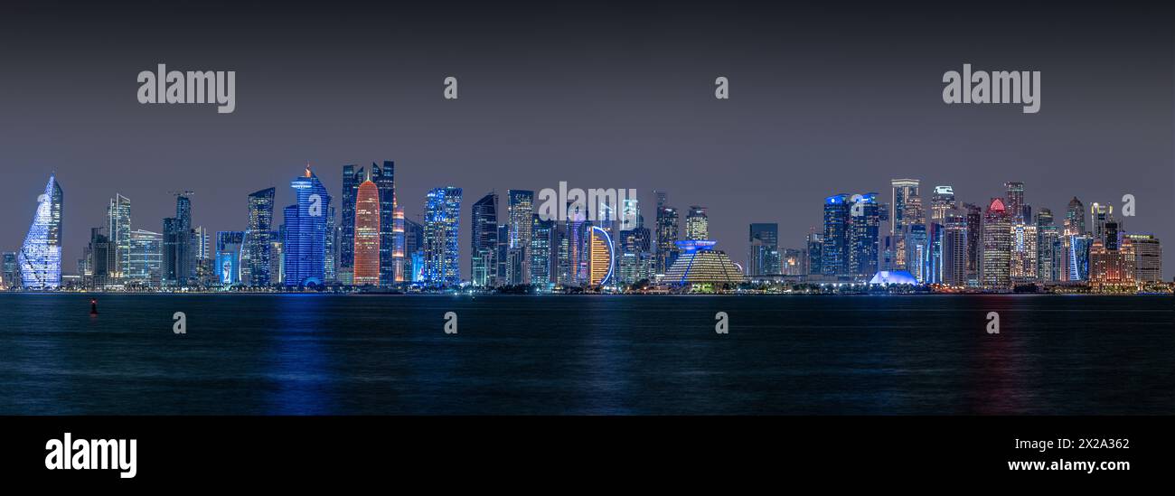 Panoramic view for Doha Skyline at night time Stock Photo - Alamy
