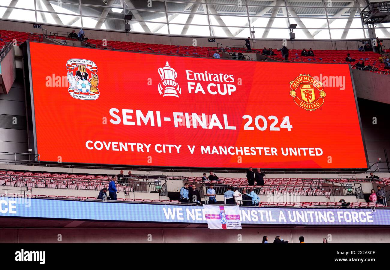 The fixture is displayed on a big screen ahead of the Emirates FA Cup ...