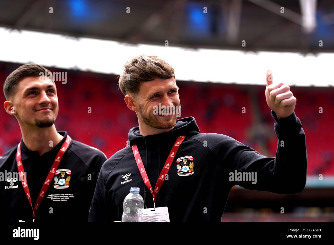 Coventry City's Bobby Thomas (left) and goalkeeper Bradley Collins ...