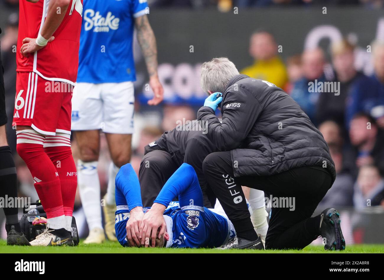 Everton’s Jarrad Branthwaite receives treatment during the Premier ...