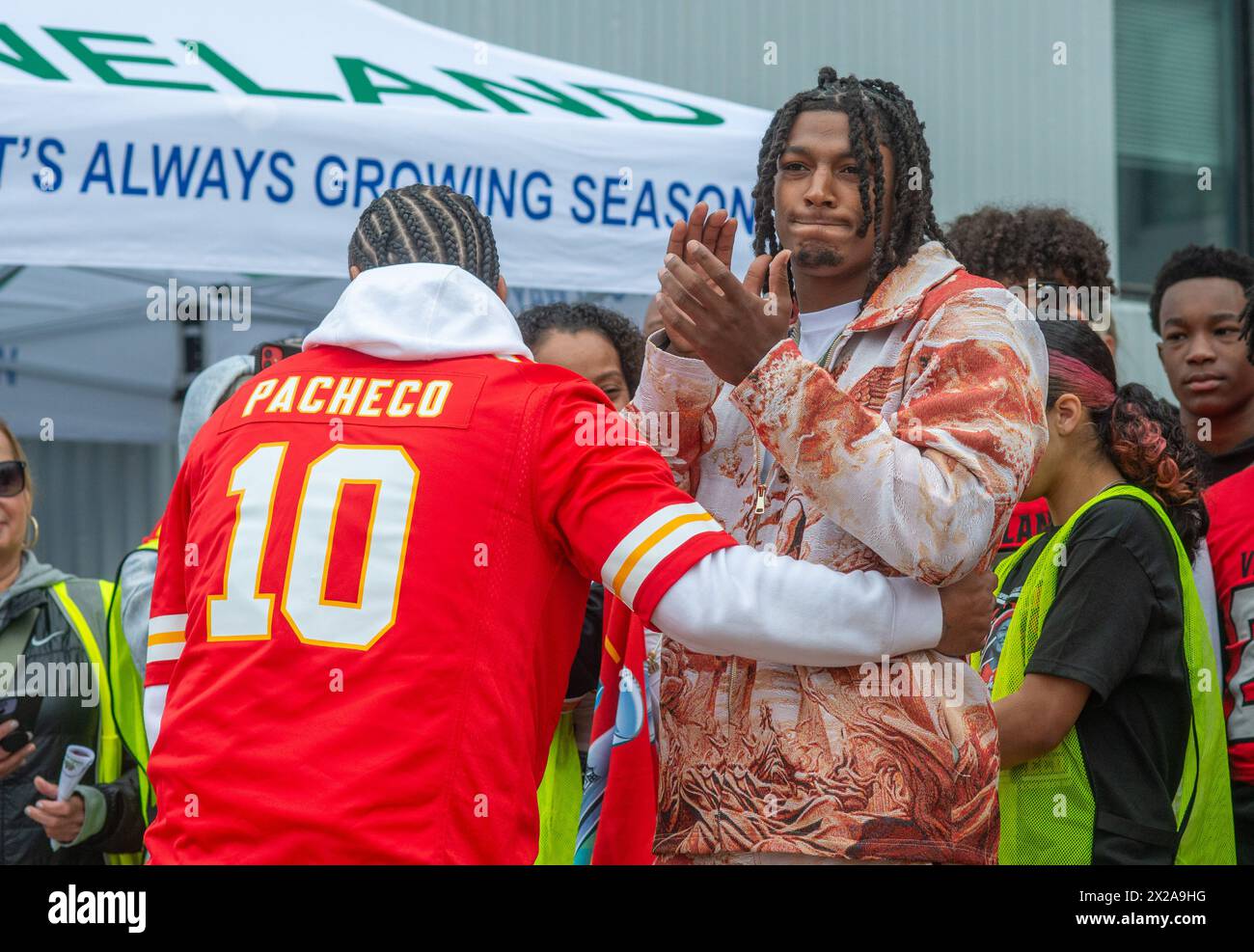 Julio Pacheco hugs his son, Kansas City Chiefs Super Bowl Champion ...