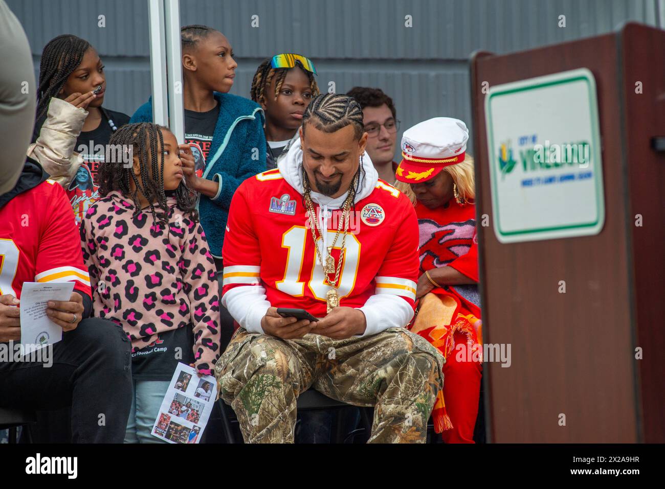 Julio Pacheco listens as people give accolades to his son, Kansas City ...