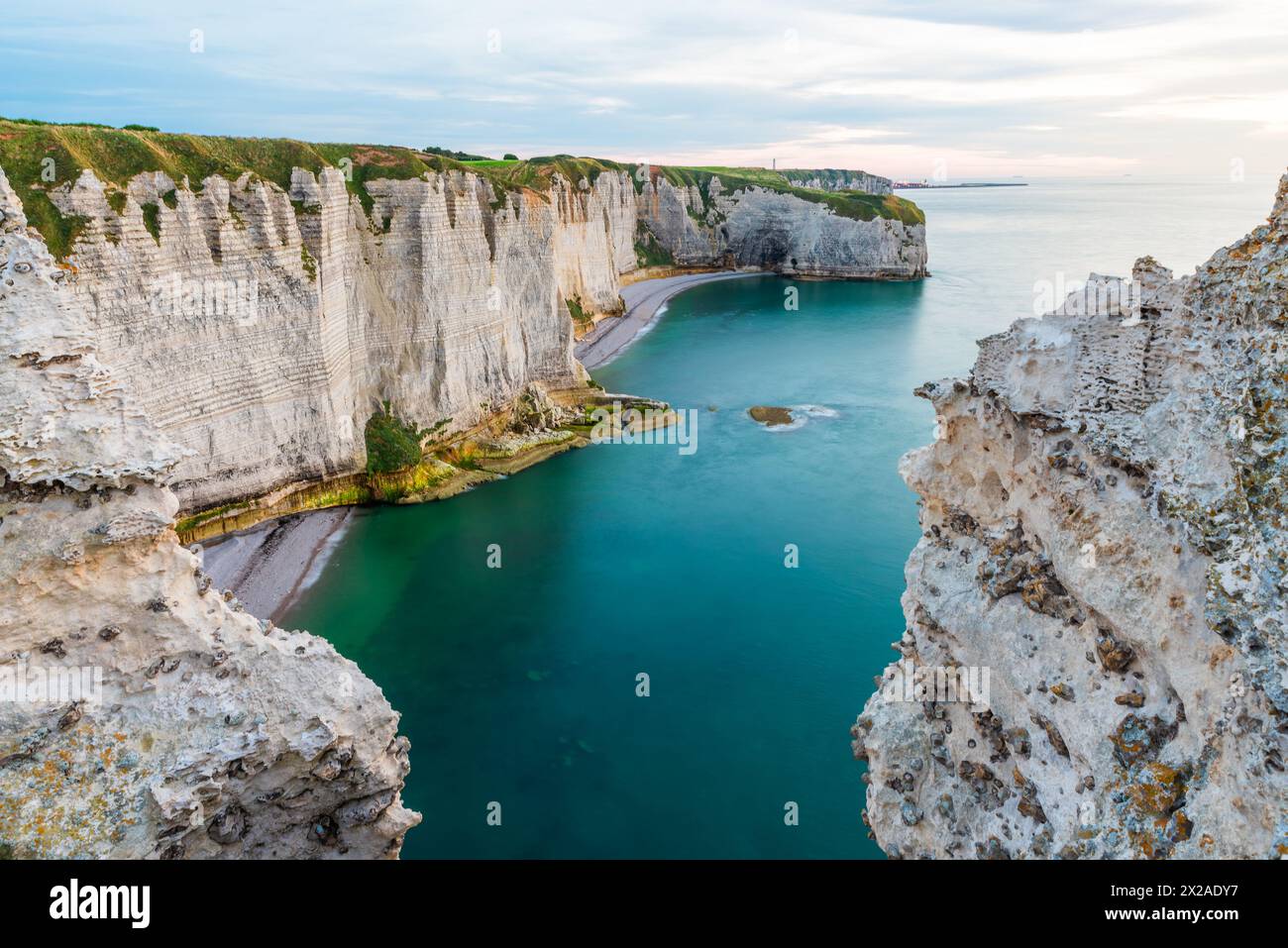 White chalk cliffs and natural arches of Etretat, Normandy, France ...
