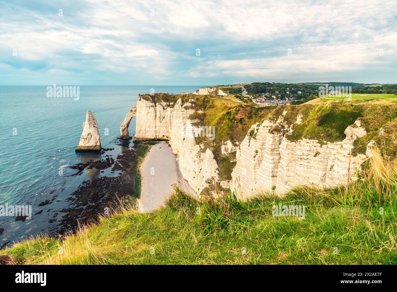 White chalk cliffs and natural arches Aval and Needle of Etretat and ...