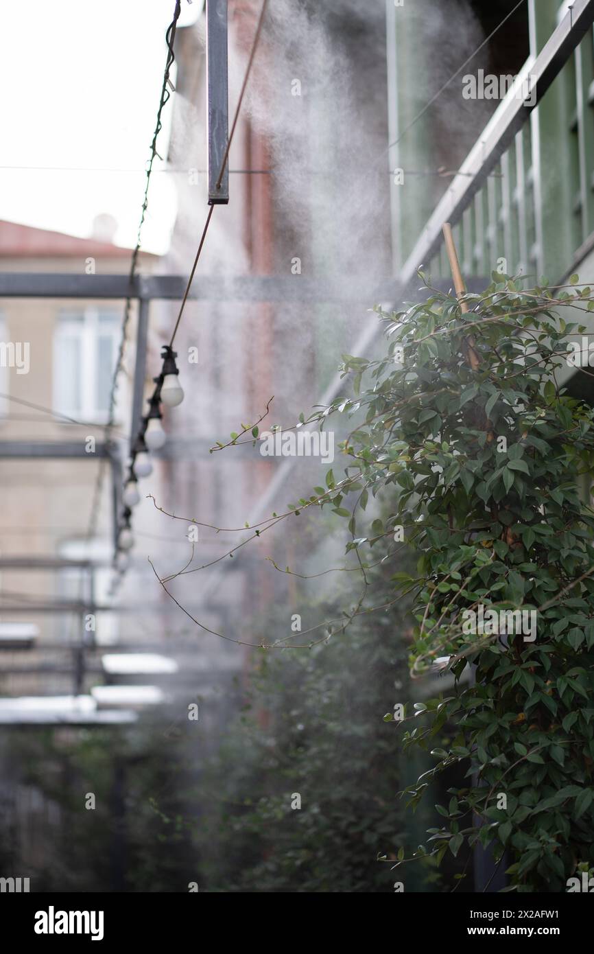 Water spraying system to make humidifier and cooling climate to reduce ...