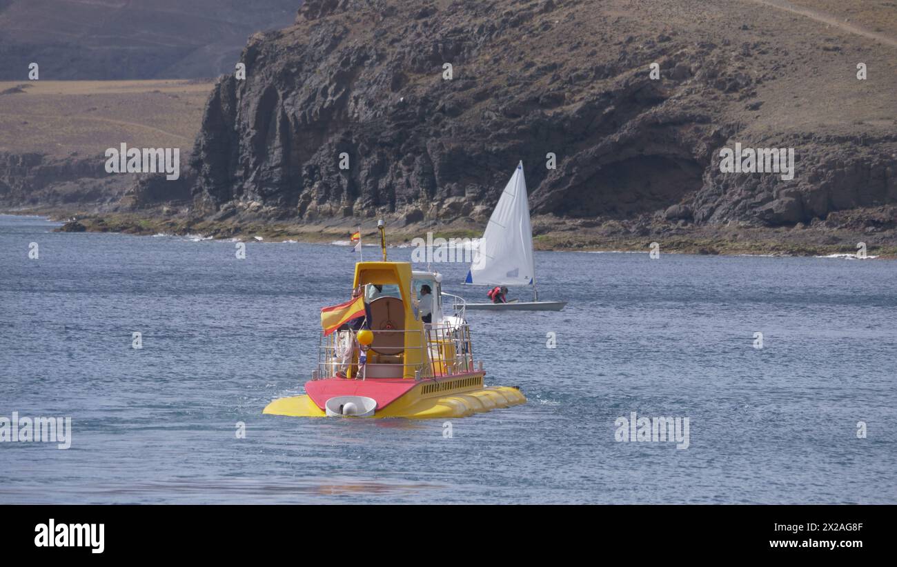 Puero Calero harbour Lanzarote. A yellow Subamarine Safaris tourist ...