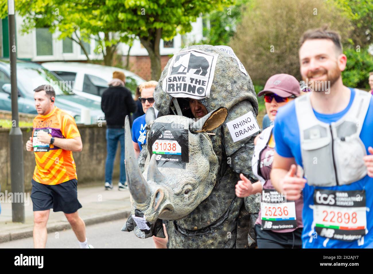LONDON, UK - 21ST APRIL 2024: People dressed up and running in the ...