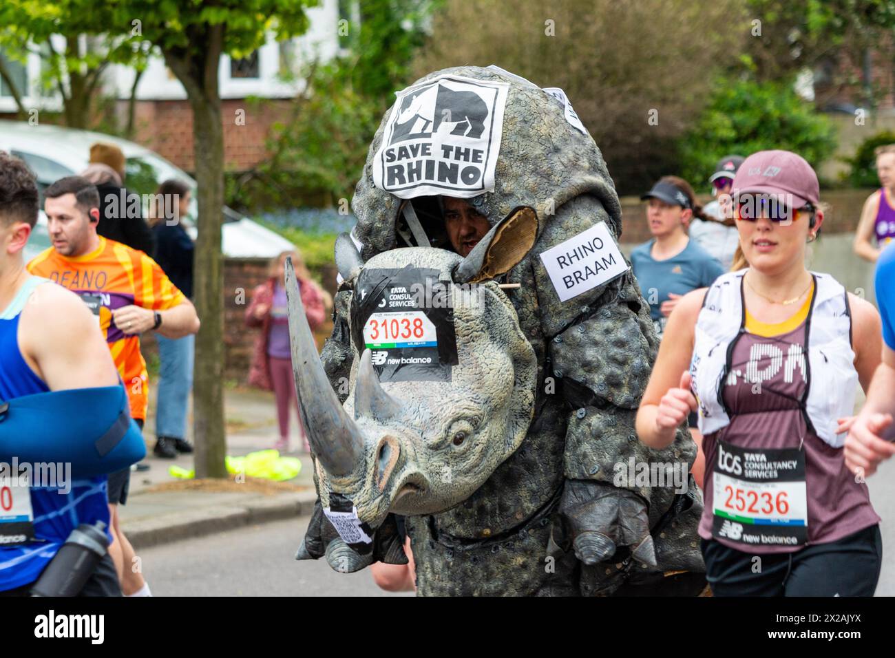 LONDON, UK - 21ST APRIL 2024: People dressed up and running in the ...
