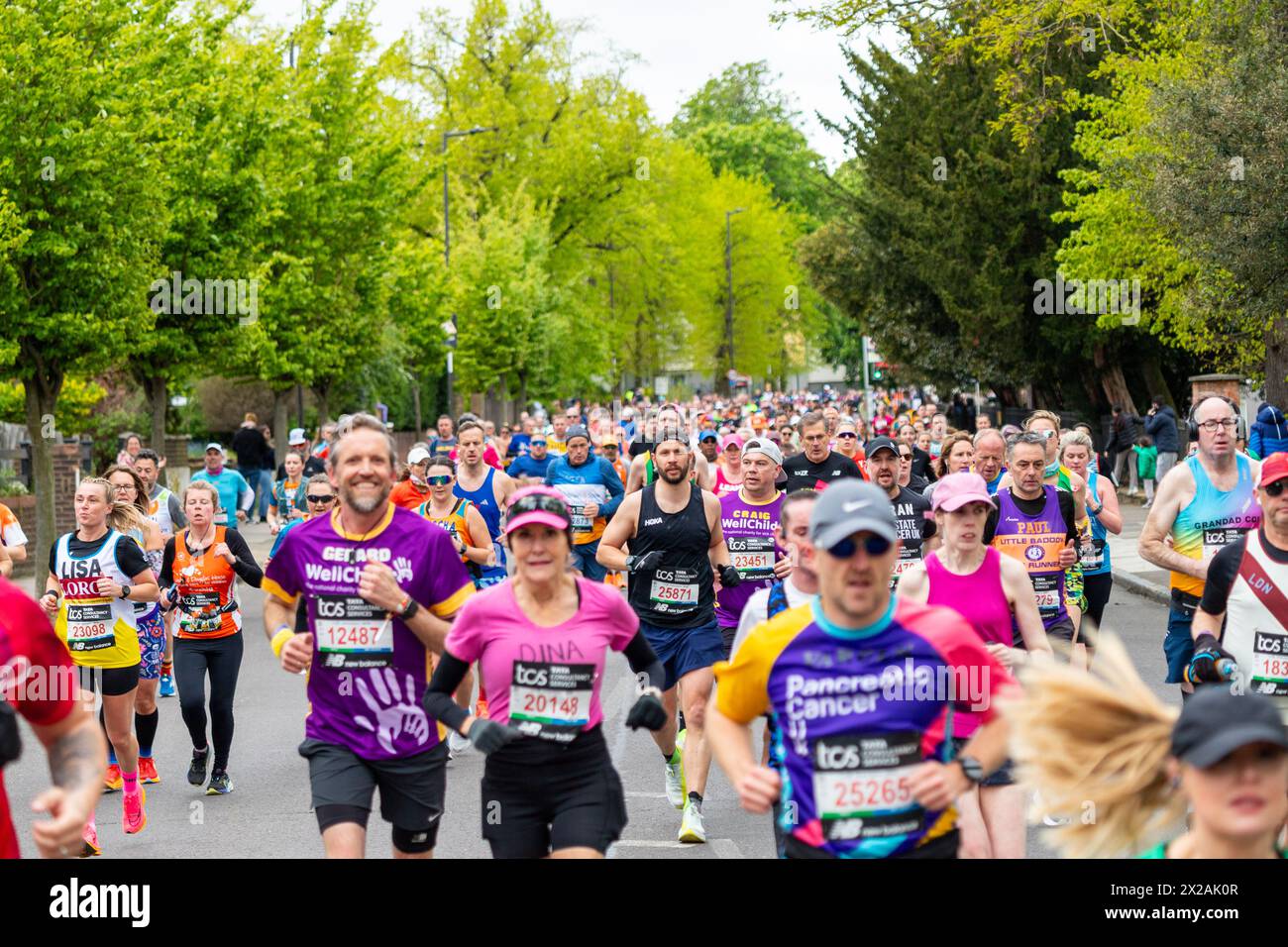 LONDON, UK - 21ST APRIL 2024: Groups of people running in the London ...