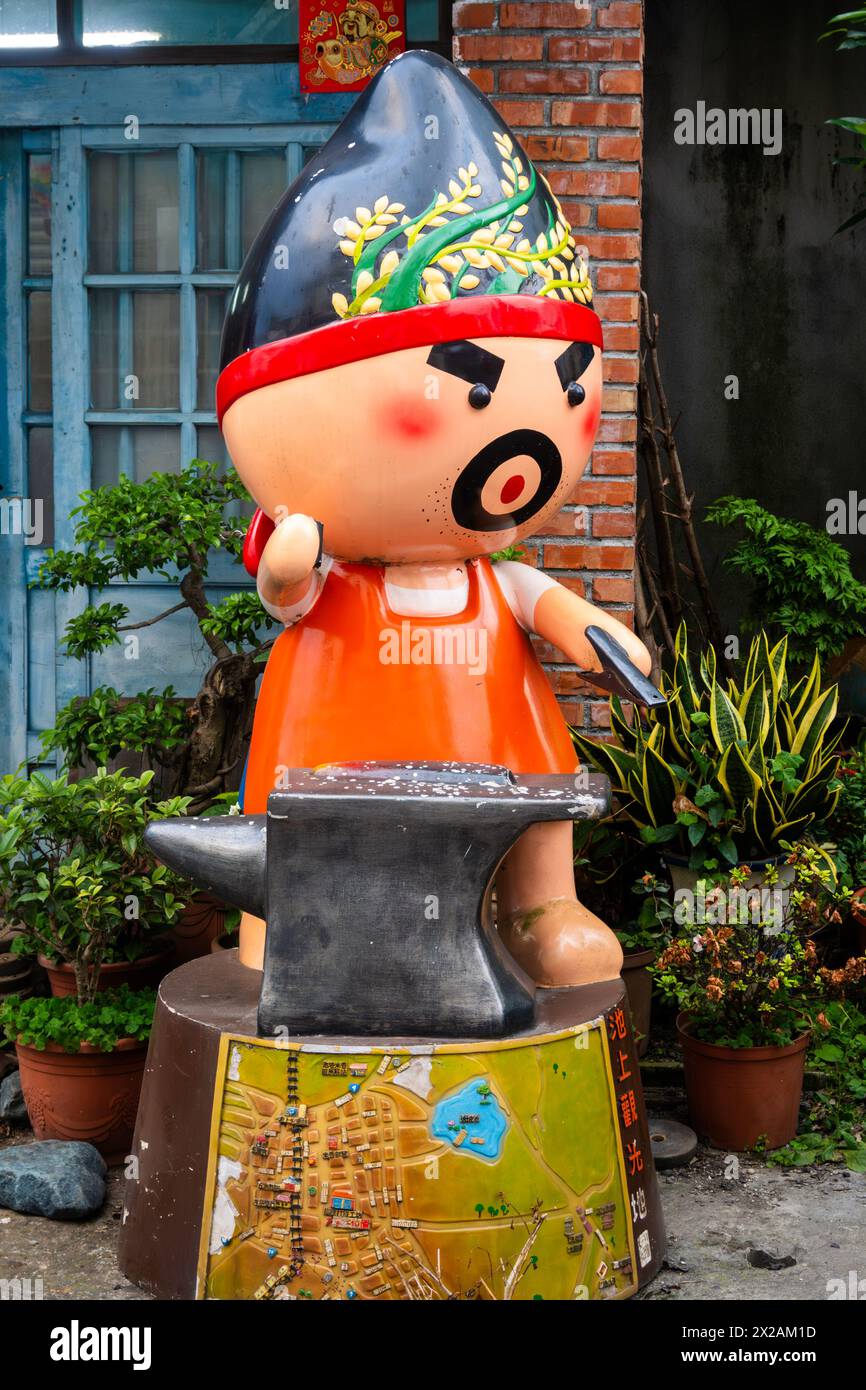 Colorful Cartoon Blacksmith Statue in Chishang, Taiwan Stock Photo - Alamy