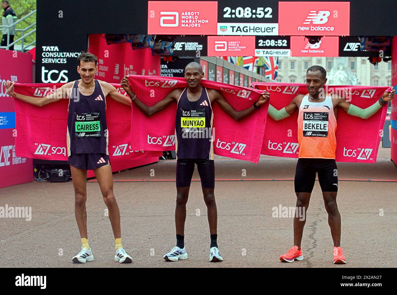 London, Britain. 21st Apr, 2024. First placed Alexander Mutiso Munyao (C) of Kenya, second ...