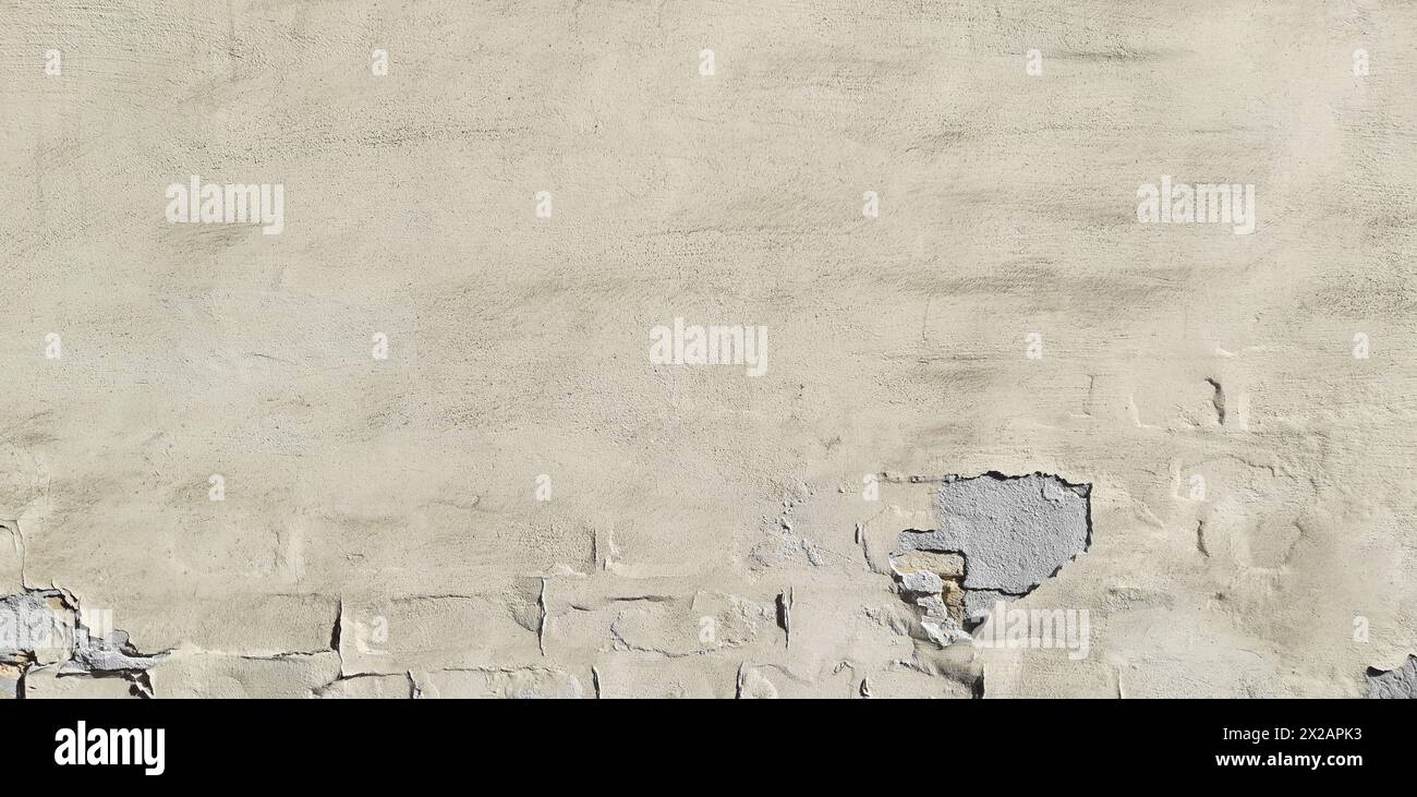 Old and cracked, dilapidated and uneven brick wall with yellowed ...