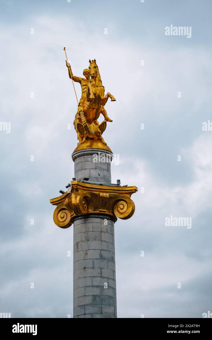Saint George statue on top of the Freedom Square column in Tbilisi city ...