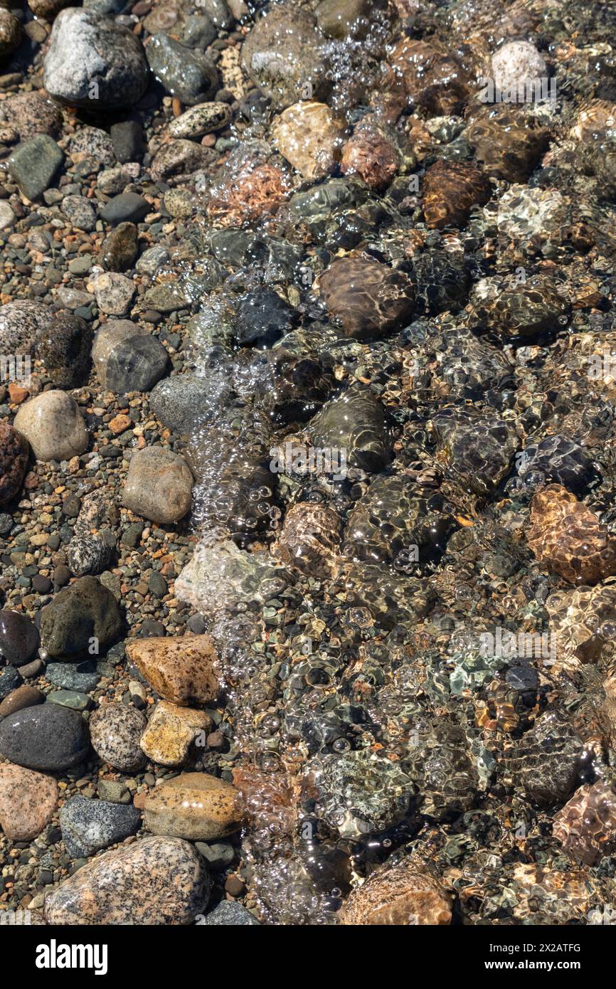 Wet sand with rocks and dirt hi-res stock photography and images - Alamy