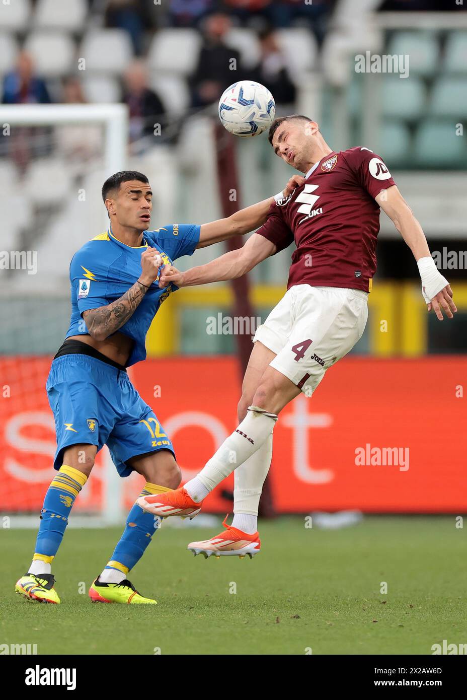 Turin, Italy, 21st April 2024. Jesus Carvalho Reinier of Frosinone Calcio clashes with ...