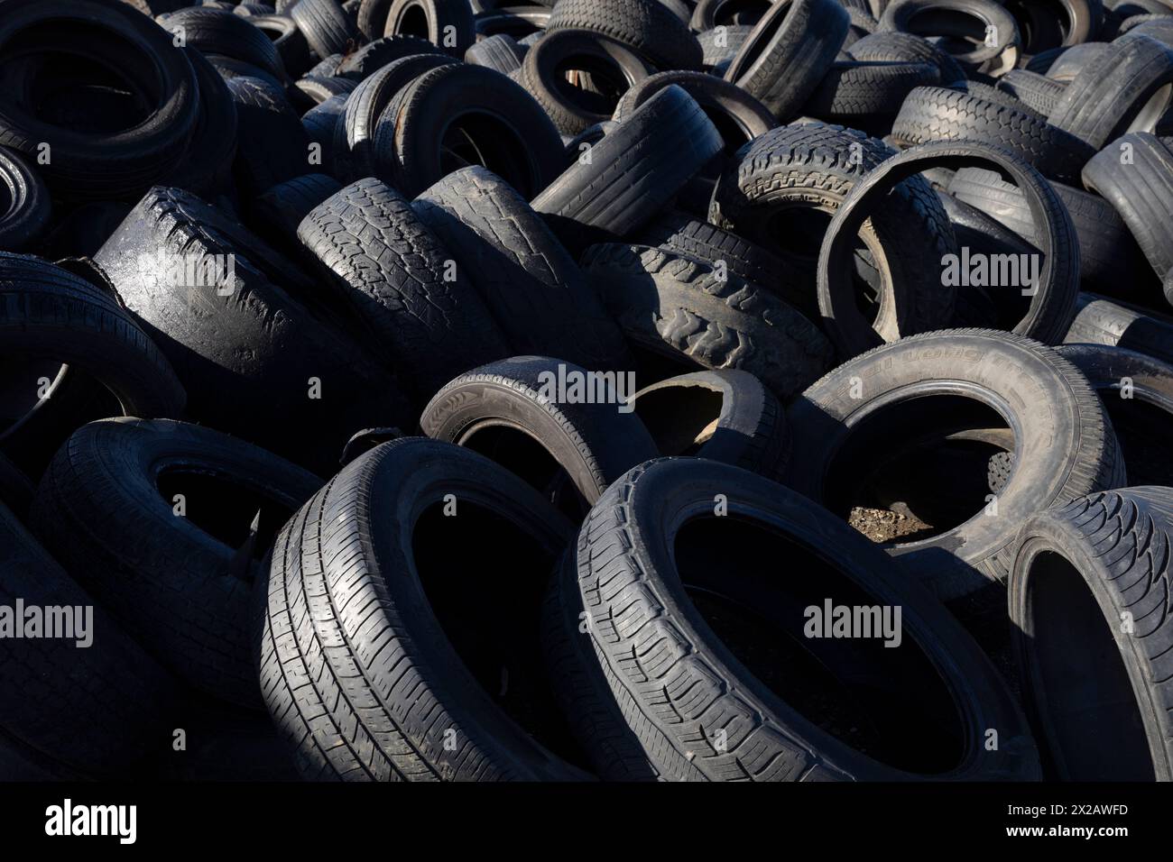 Pile tires in junkyard hi-res stock photography and images - Alamy