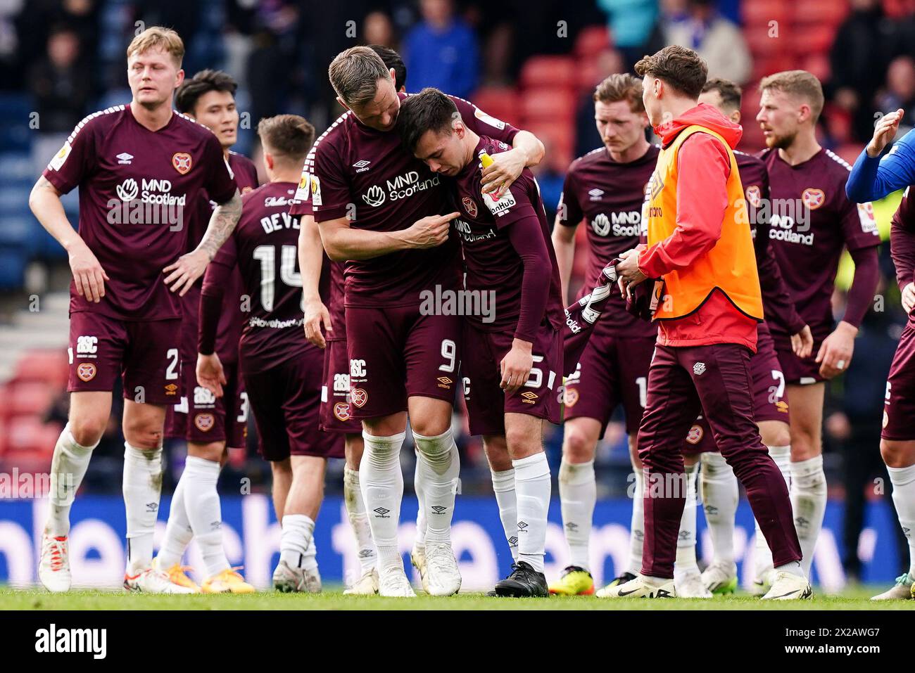 Heart of Midlothian's Lawrence Shankland consoles team-mate Macauley ...