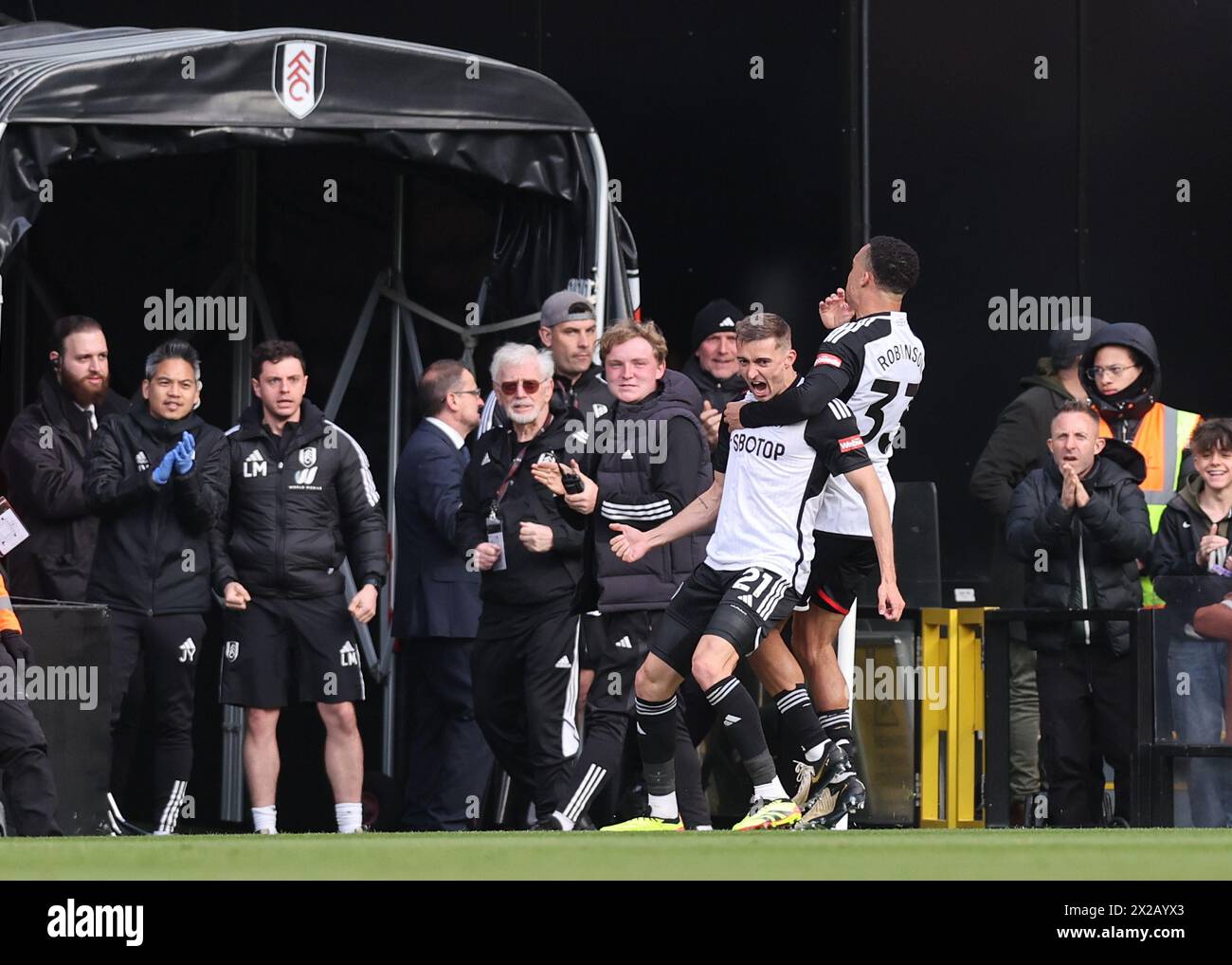 London, England, 21st April 2024. Timothy Castagne of Fulham celebrates ...