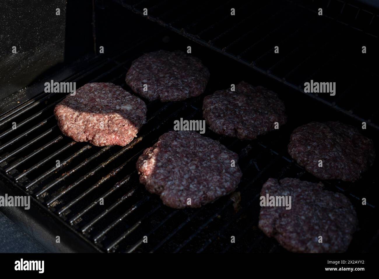 patty beef burgers cooked on Grill and smoker Stock Photo - Alamy