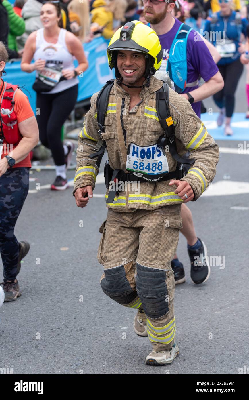 Running fireman hi-res stock photography and images - Alamy