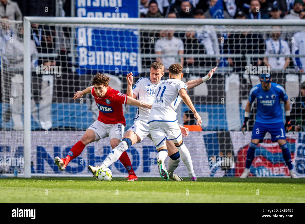 Copenhagen, Denmark. 21st Apr, 2024. Silkeborg's Alexander Lind, FCK's ...