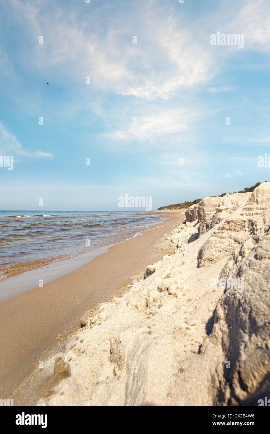 Sea shore, the bright and clean sand brought by the waves looks like ...