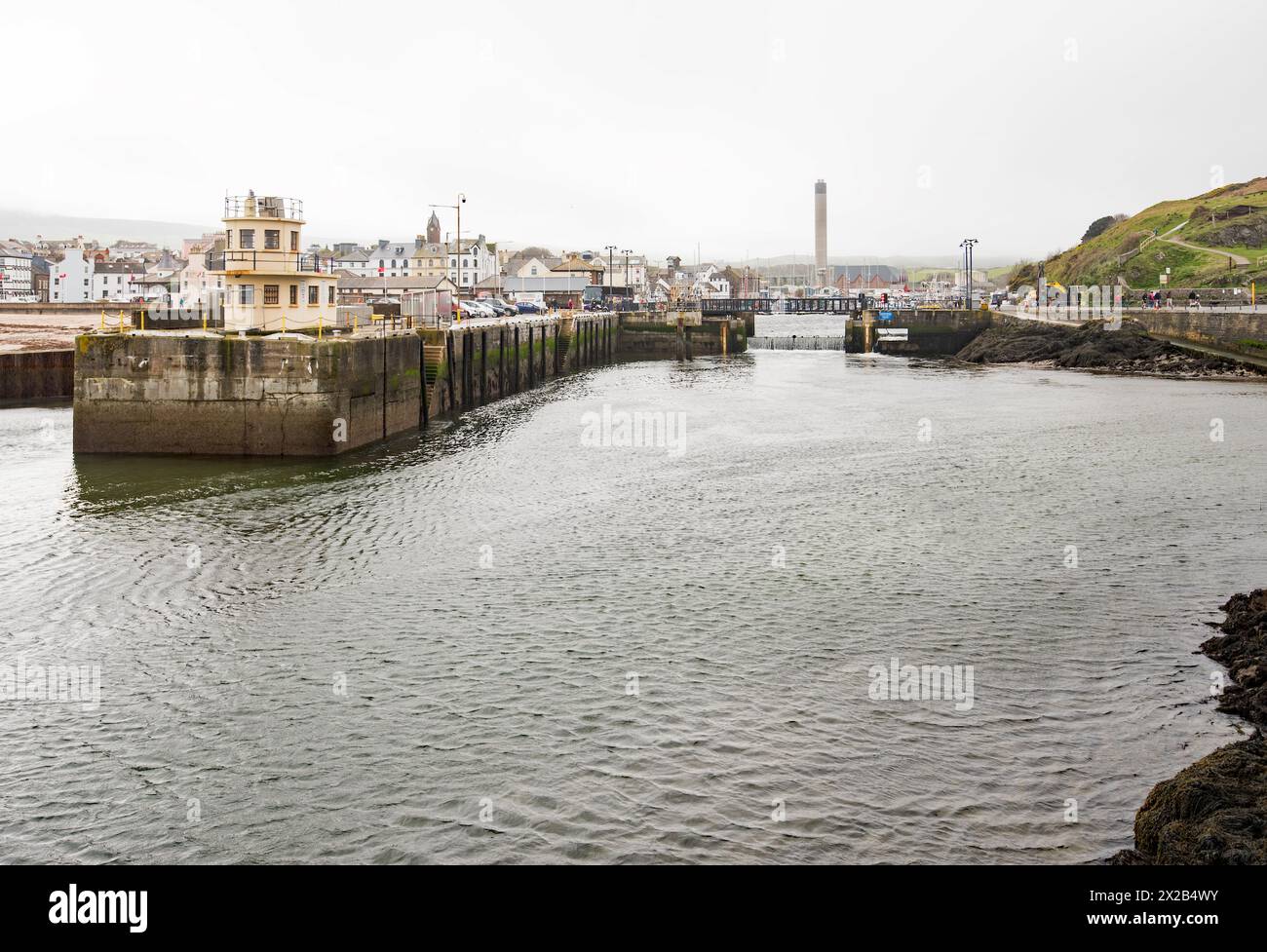 Water outflow beneath the bridge at Peel harbour , Isle of Man Stock ...