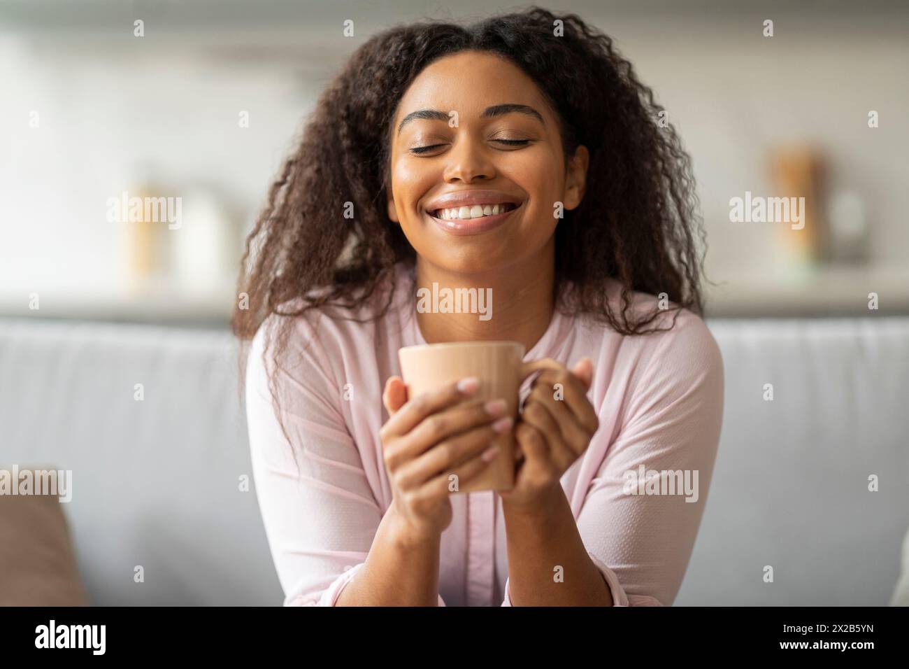 Happy millennial african woman hi-res stock photography and images - Alamy
