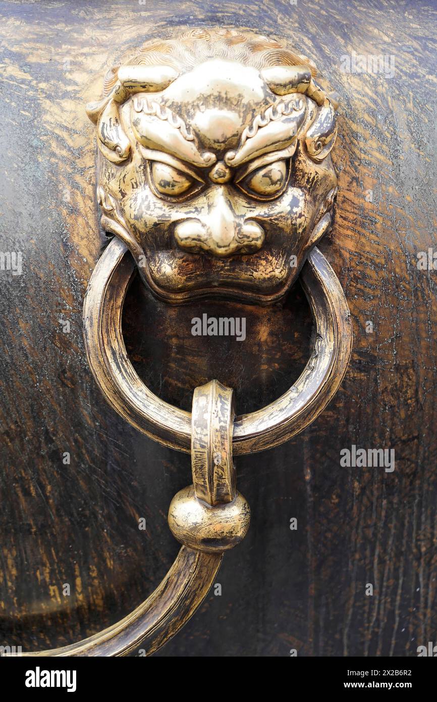 China, Beijing, Forbidden City, UNESCO World Heritage Site, Close-up of a detailed lion's head ...