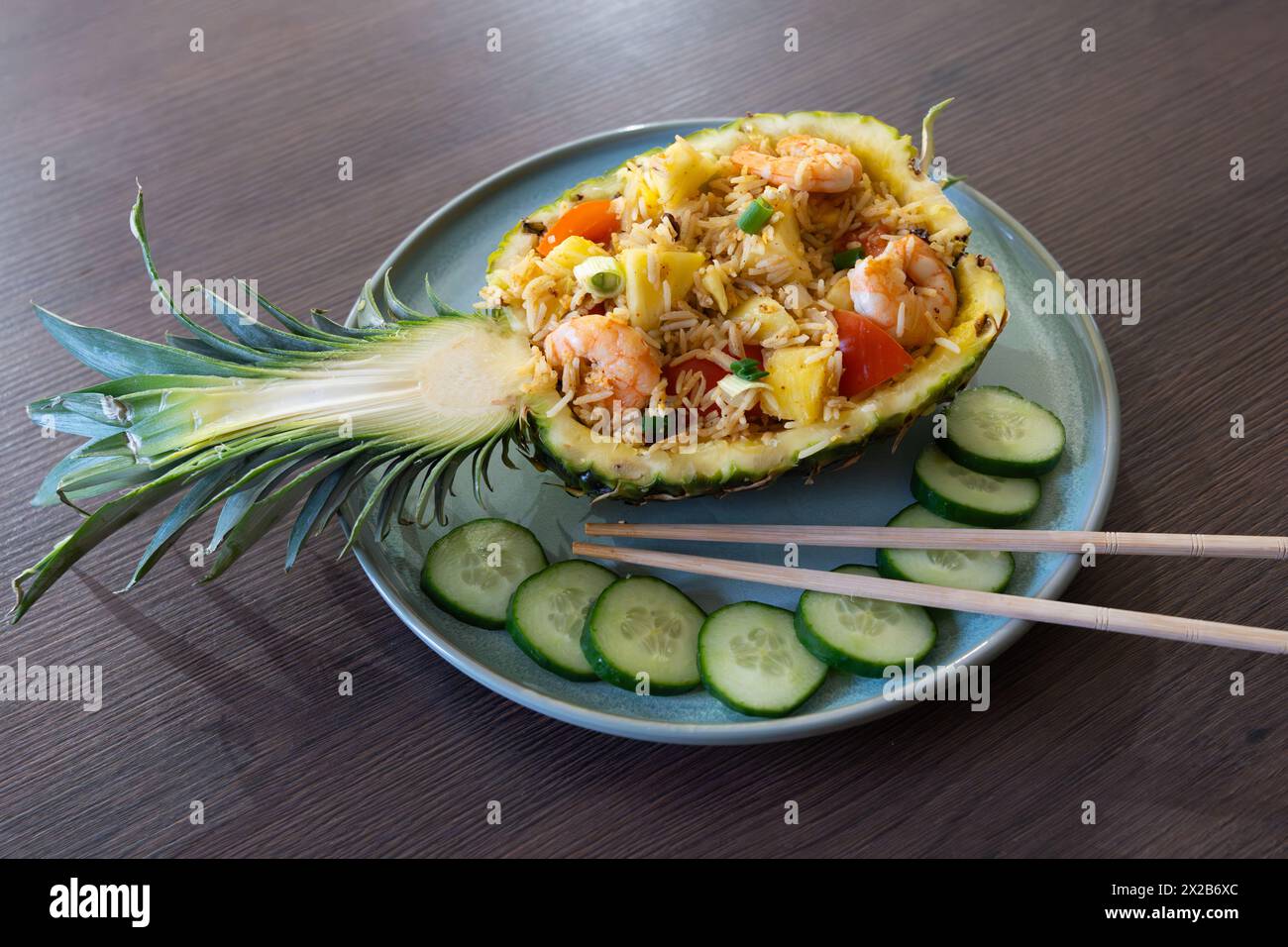 Pineapple fried rice is originally of Thai origin. Here is a homemade ...