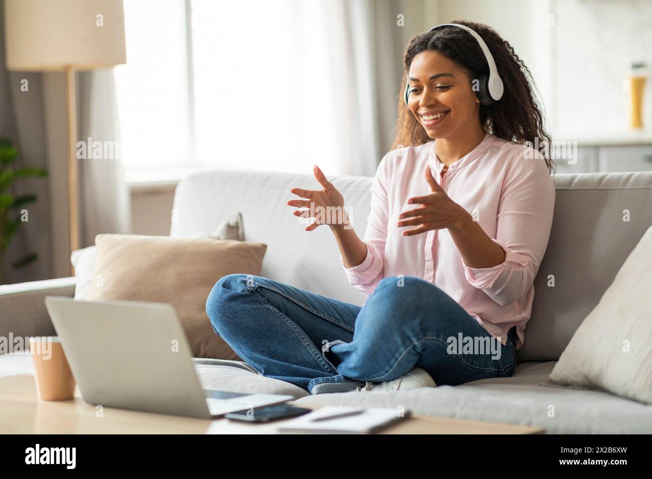 Lady talking virtual meeting laptop hi-res stock photography and images ...
