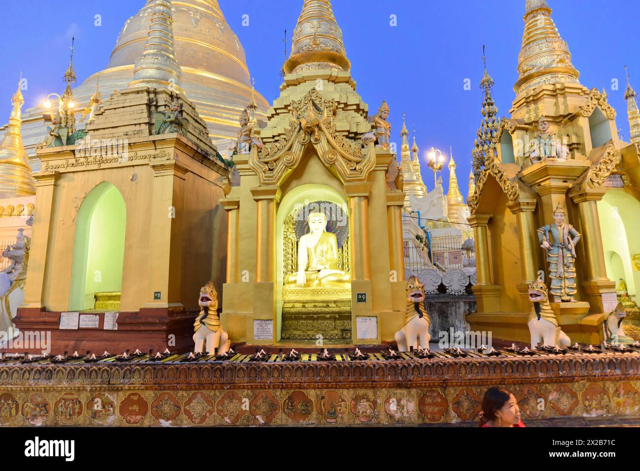 Shwedagon Pagoda, Yangon, Myanmar, Asia, A Buddha statue in front of ...