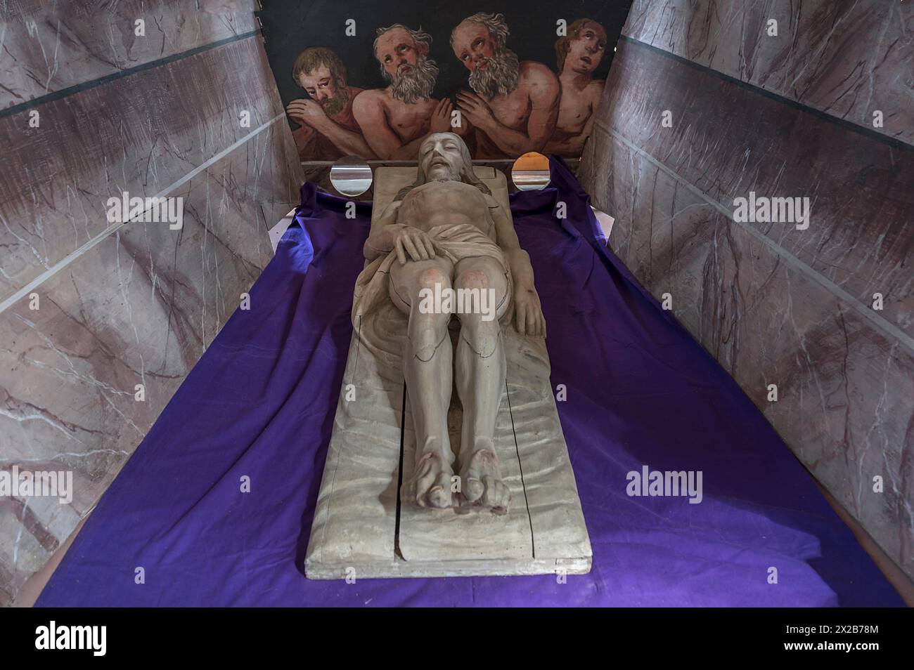 Figure of Christ in the Holy Sepulchre, behind a motif of three men in ...
