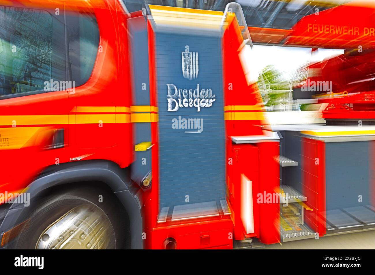 Close-up of a part of a fire engine with the coat of arms of Dresden ...