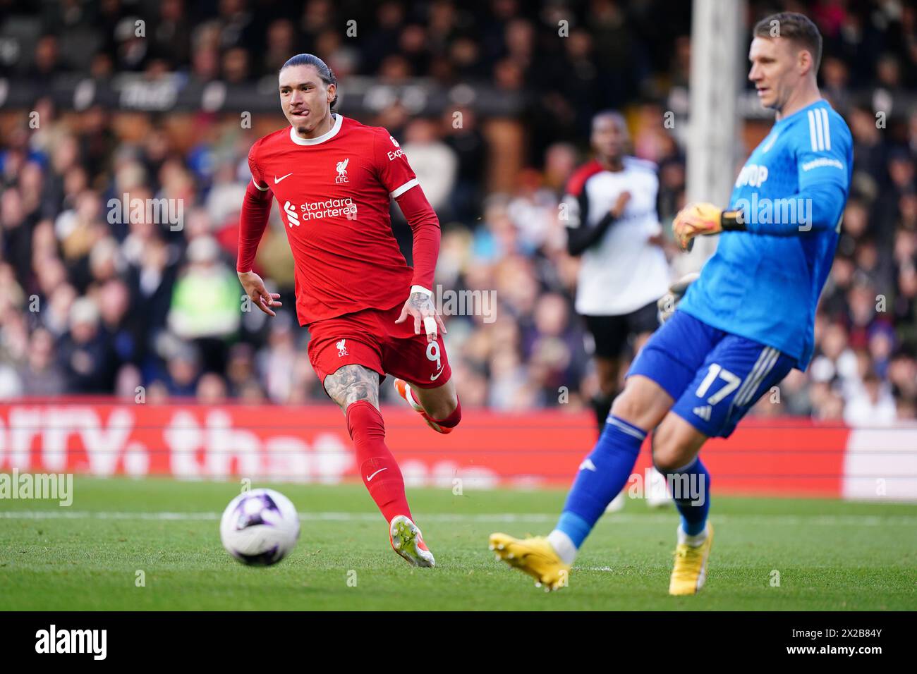 Liverpool's Darwin Nunez in action against Fulham goalkeeper Bernd Leno ...