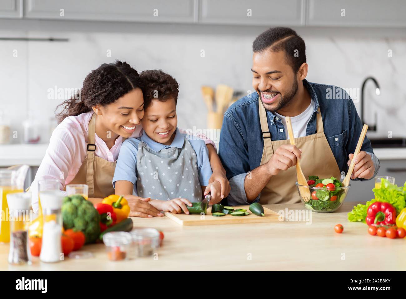African american family working in hi-res stock photography and images ...