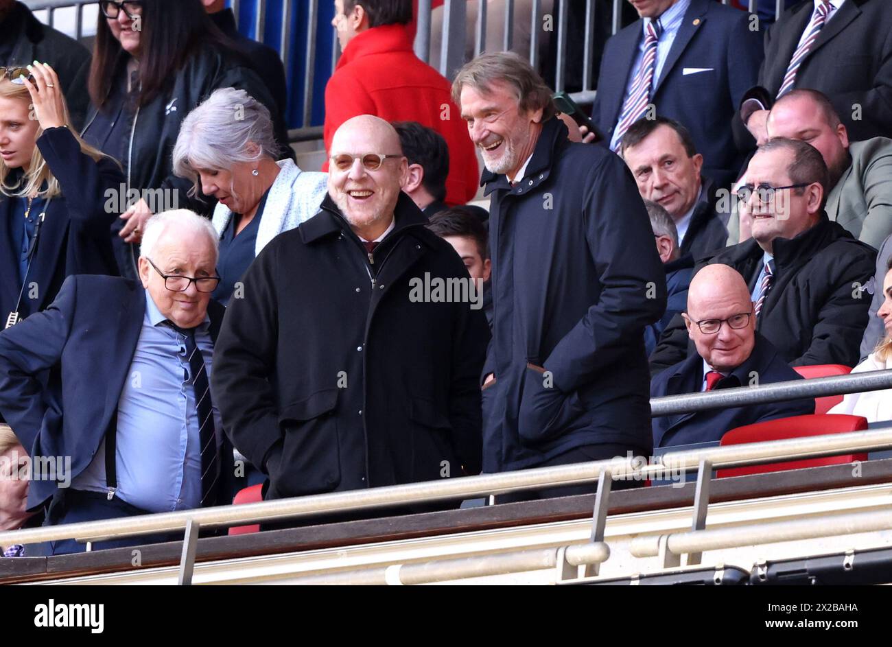 London, UK. 21st Apr, 2024. Avram Glazer and Sir Jim Ratcliffe enjoy a ...